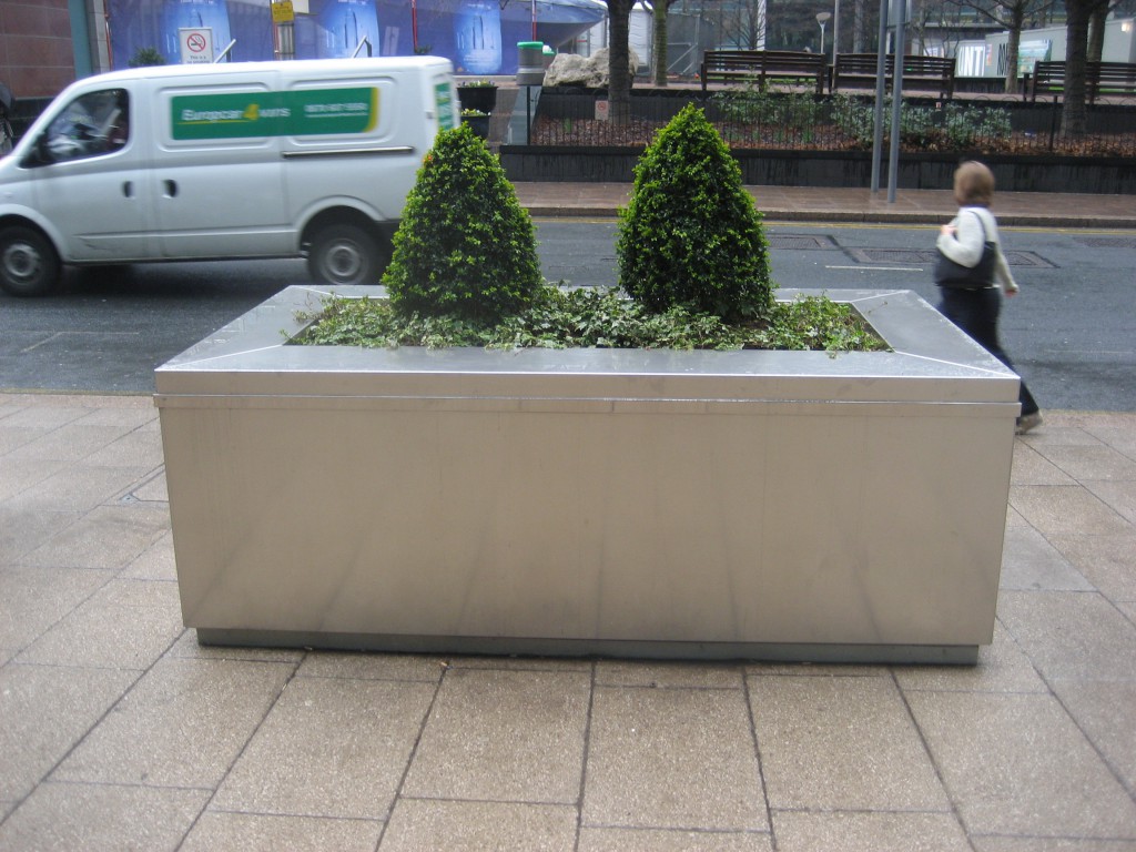 rimex linen stainless steel planters at canary wharf - Christian Day Ltd